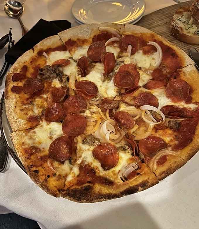 Brick oven pizza with pepperoni and sausage &ndash; sometimes the classics become classics for very good reasons indeed.