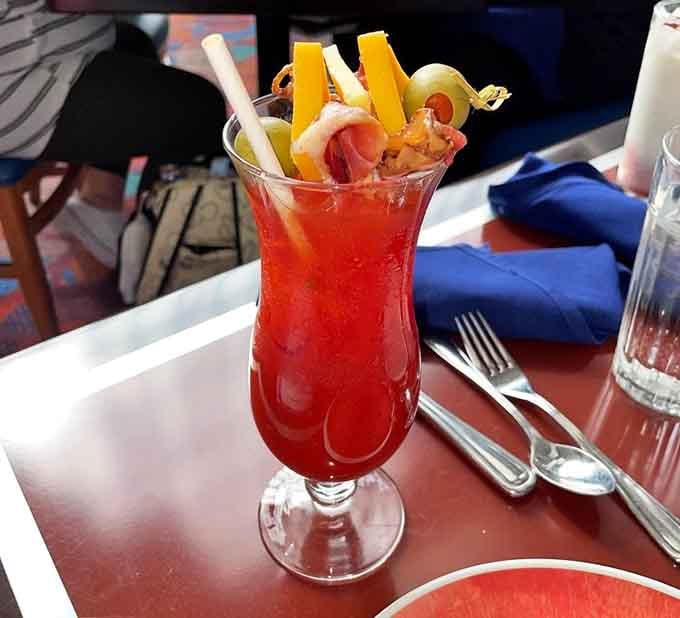 This Bloody Mary comes loaded with enough garnishes to qualify as both drink and appetizer in one spectacular glass.