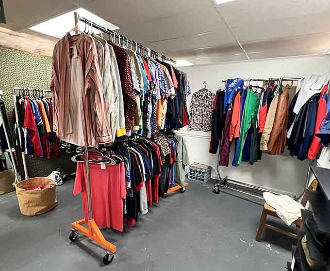 Vintage leather jackets and colorful finds hanging like a timeline of fashion's greatest hits and misses.