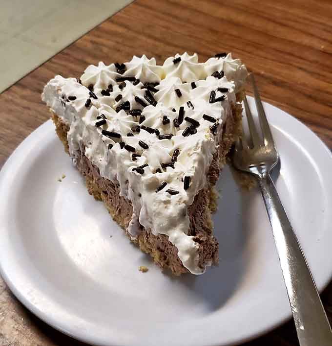 Chocolate cream pie topped with whipped cream rosettes&mdash;because sometimes dessert for breakfast is the only logical choice available.