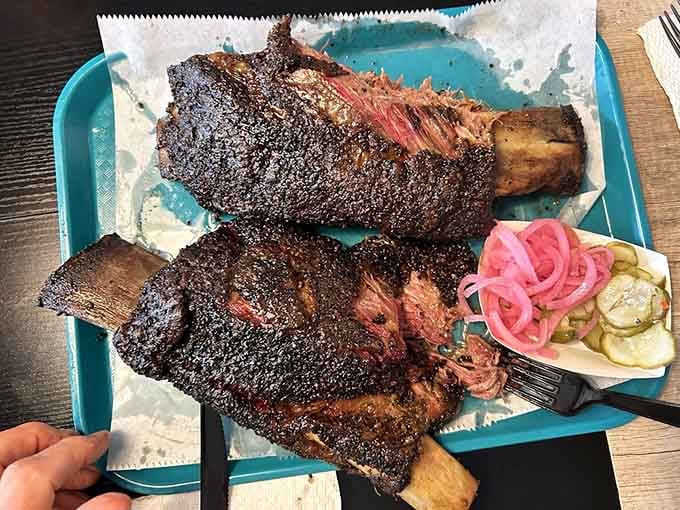 Ribs with a bark so perfect they look like they belong in a barbecue museum, not on your plate.
