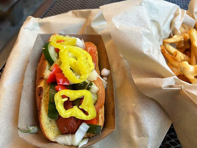 The Chicago dog comes loaded with more toppings than a Supreme Court case, and it's equally satisfying.