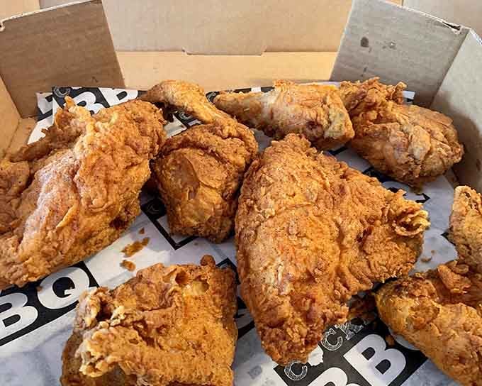 Fried chicken with that crackling crust that sounds like applause when you bite into the juicy interior beneath.