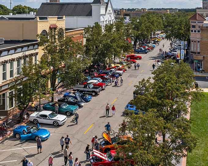 Classic cars line the streets during events, turning downtown into a rolling museum of American automotive history.