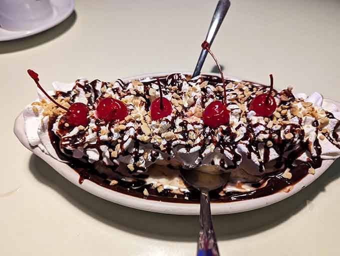 The banana split that launched a thousand napkin requests&mdash;chocolate, nuts, cherries, and zero regrets about life choices made.