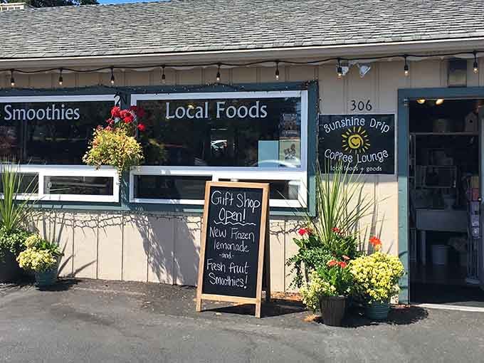 Fresh lemonade and local foods beckon from this cheerful storefront, where hanging baskets add their own colorful commentary.