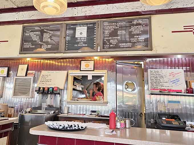 The pass-through window and chalkboard specials reveal where the magic happens, one order at a time.