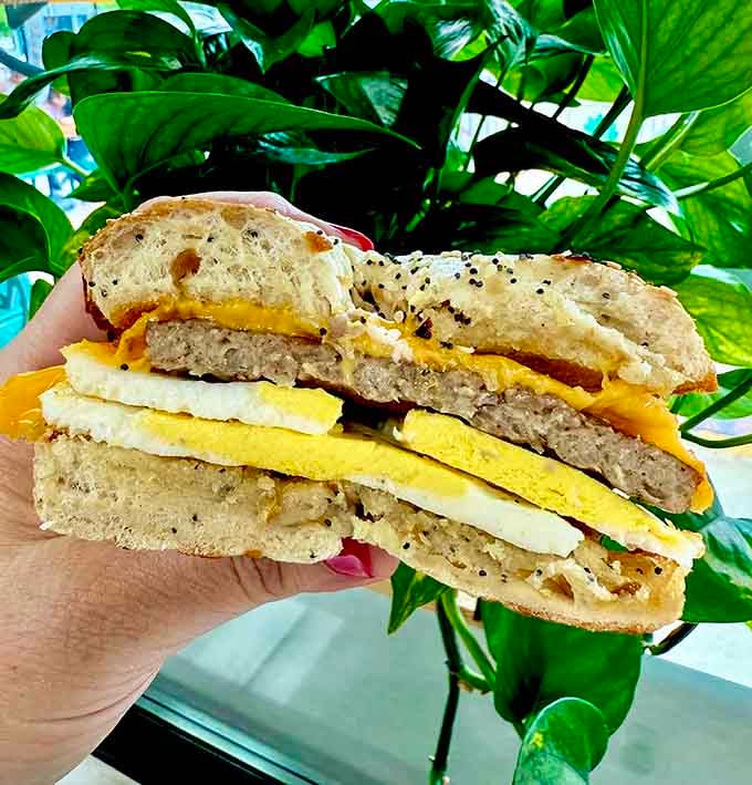 This bagel sandwich is stacked higher than your morning expectations and ready to exceed every single one of them.