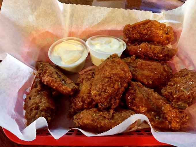 Golden fried wings with creamy dipping sauces are the kind of bar food that keeps you coming back.