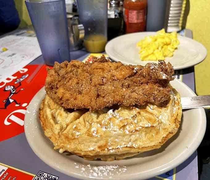 Chicken and waffles sitting pretty on a plate, proving sweet and savory were always meant to be together.