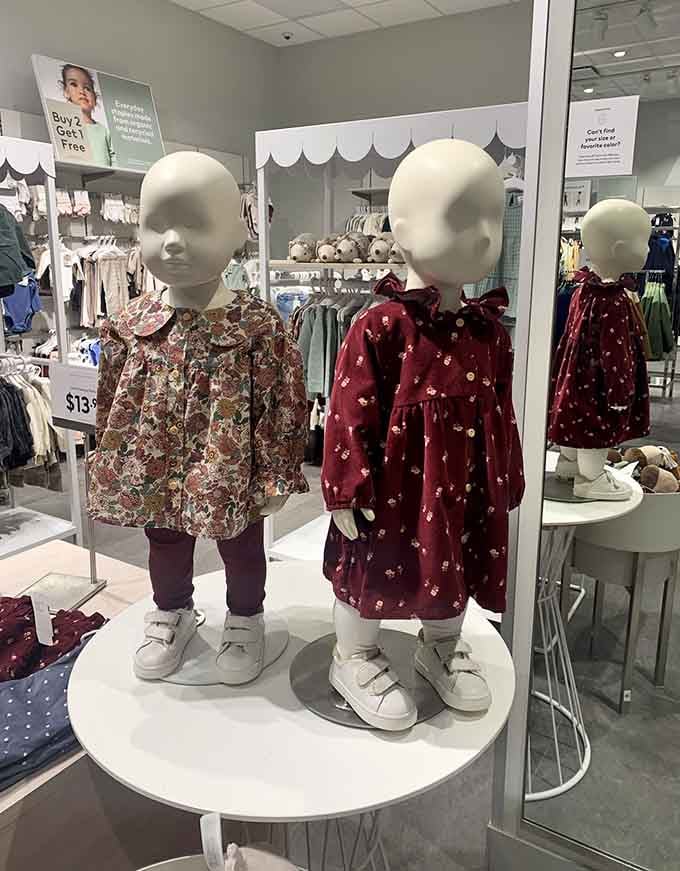 Tiny mannequins modeling adorable outfits that'll last approximately three weeks before kids outgrow them completely.