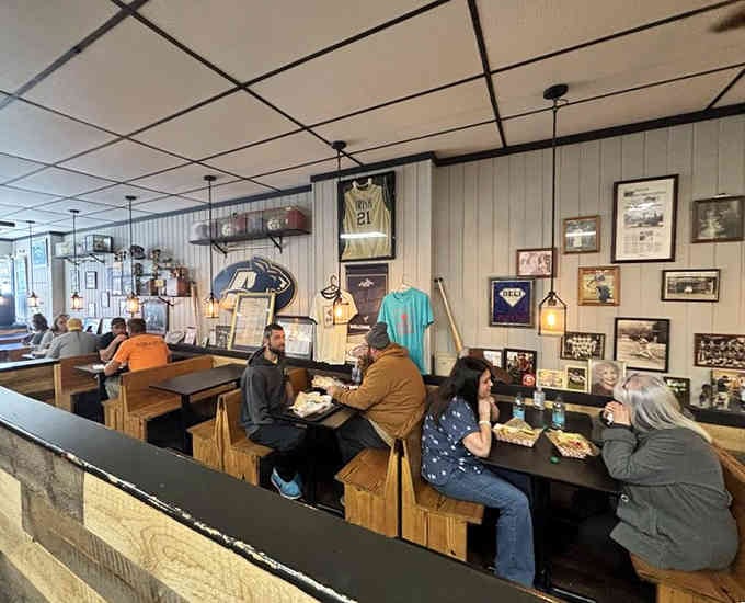 The dining room buzz of happy customers enjoying what neighborhood delis do best: feed people well.