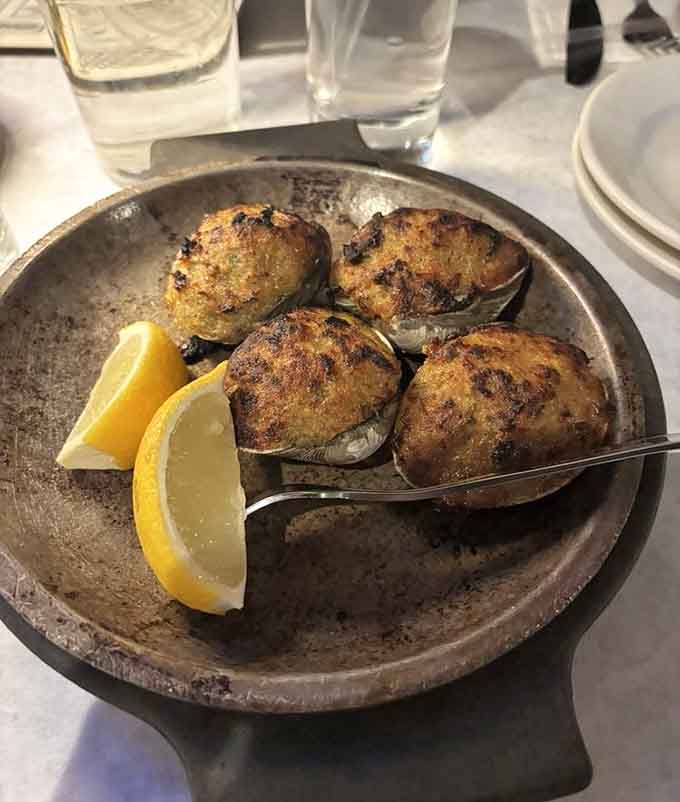 Baked clams that prove this pub knows its way around more than just ground beef and buns.
