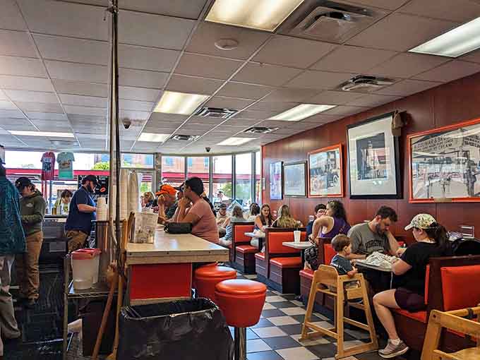 Families filling the booths, creating new memories in a space that's witnessed countless celebrations over the decades.