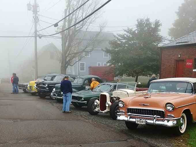 Vintage automobiles gathering in the mist like they're auditioning for a Stephen King novel, but friendlier and less murderous.
