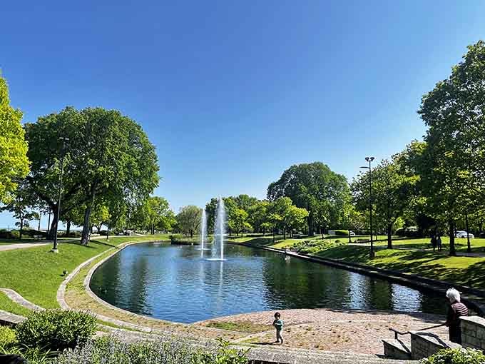 Dawes Park's fountain creates that European plaza vibe where time slows down and stress evaporates.
