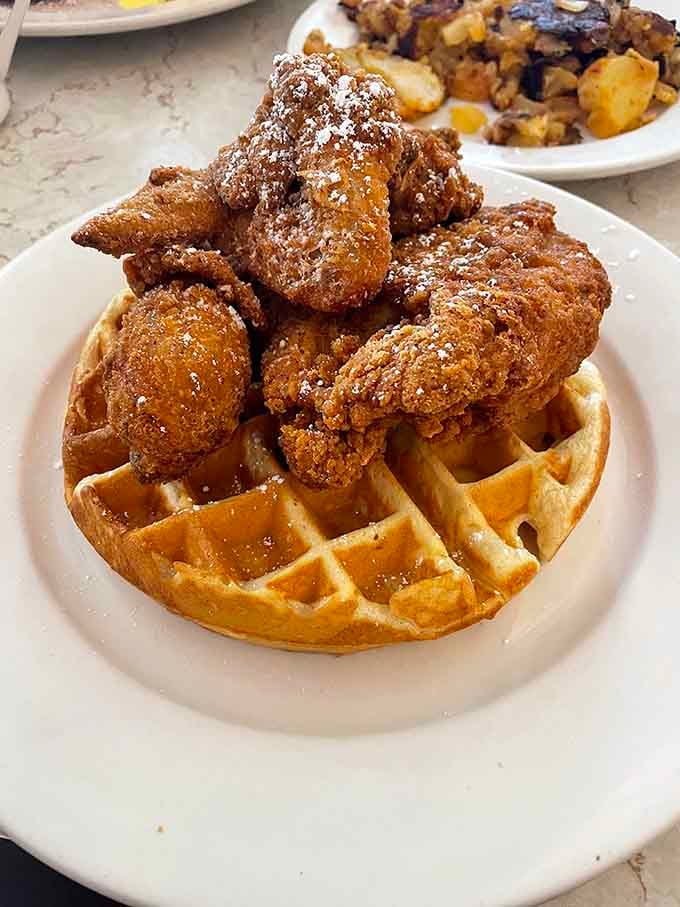 Chicken and waffles: the culinary equivalent of introducing your two best friends and watching them become inseparable dining companions.