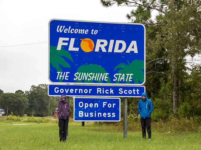 When you need two people to properly express the joy of crossing into the Sunshine State.
