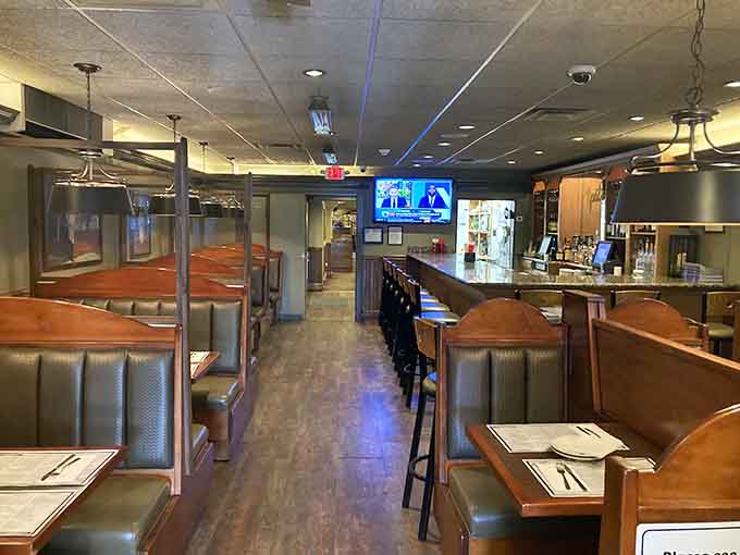 Booth seating and a full bar visible in the background, this is where casual dining meets genuine hospitality in the best possible way.