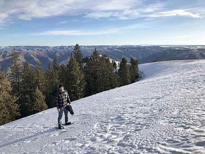 Walking toward that vista where the earth drops away and three states spread out below you.