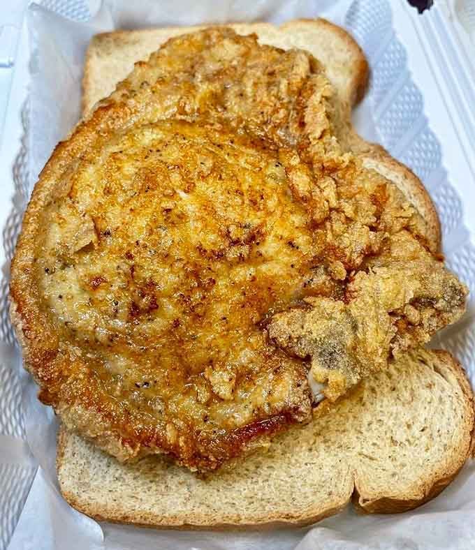 A pork chop sandwich this substantial deserves its own zip code and possibly a standing ovation from your stomach.