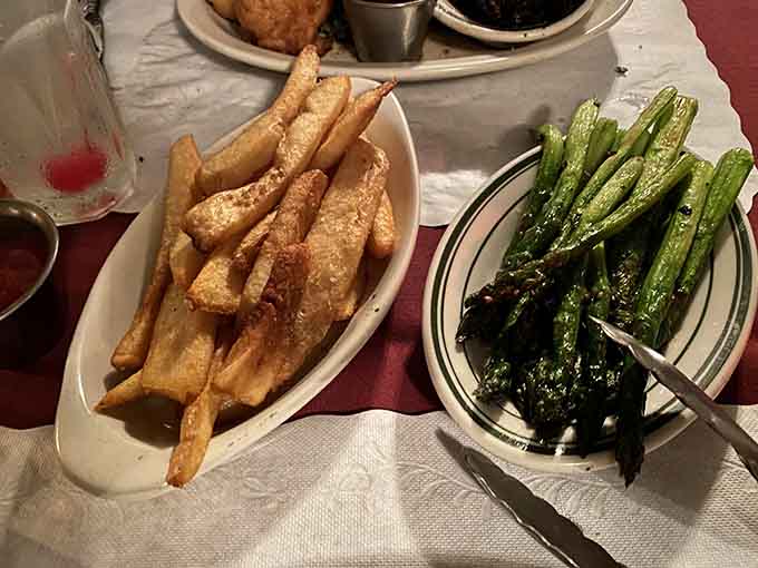 Crispy fries and perfectly cooked asparagus prove that even the supporting cast deserves a standing ovation here.