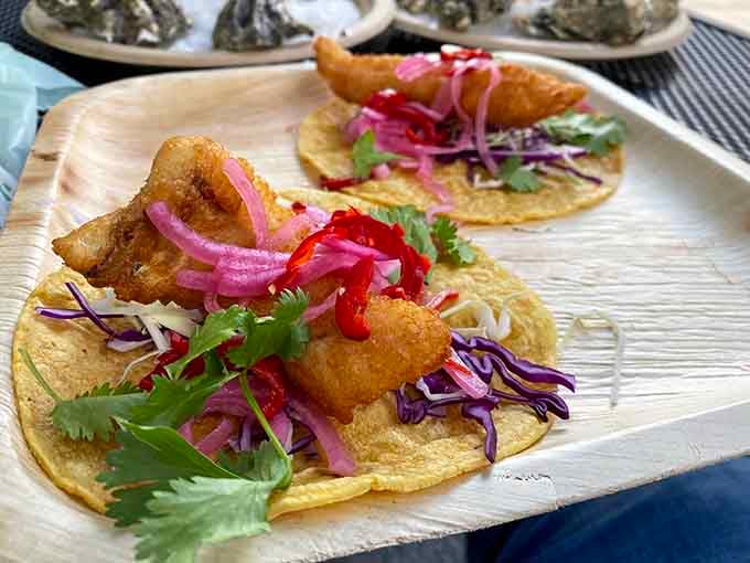 These fish tacos are dressed to impress with pickled onions and fresh toppings that make every bite sing with flavor.
