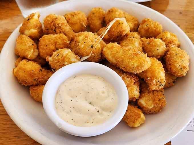 Golden cheese curds with a dipping sauce that'll make you understand why Wisconsin takes dairy so seriously, friends.