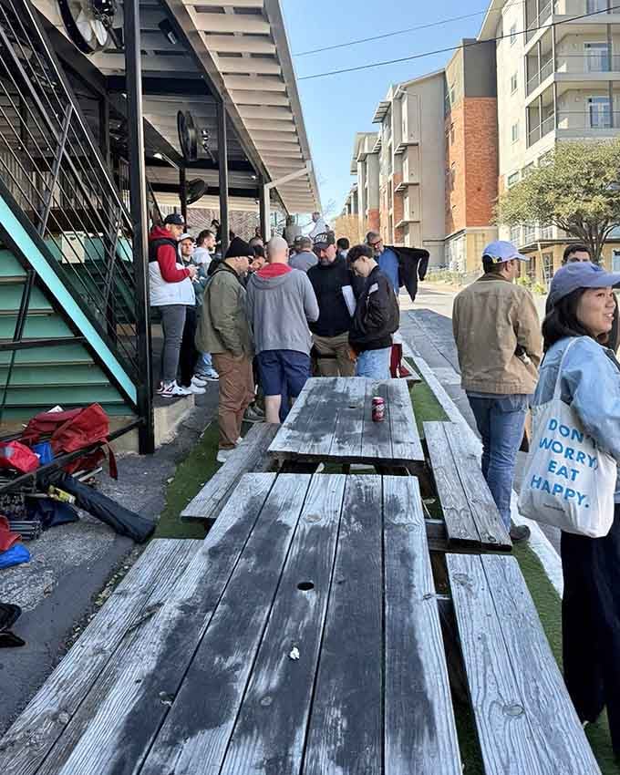 The line stretches long, but those picnic tables offer hope and a place to rest your barbecue-dreaming bones.