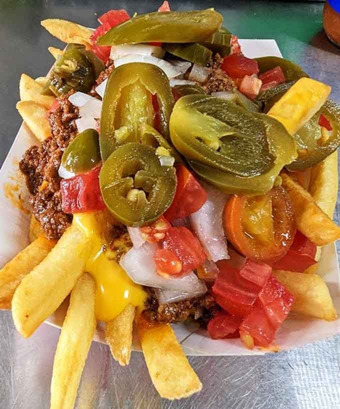 When fries become a canvas for chili, cheese, and jalape&ntilde;os, you've crossed from side dish into main event territory beautifully.