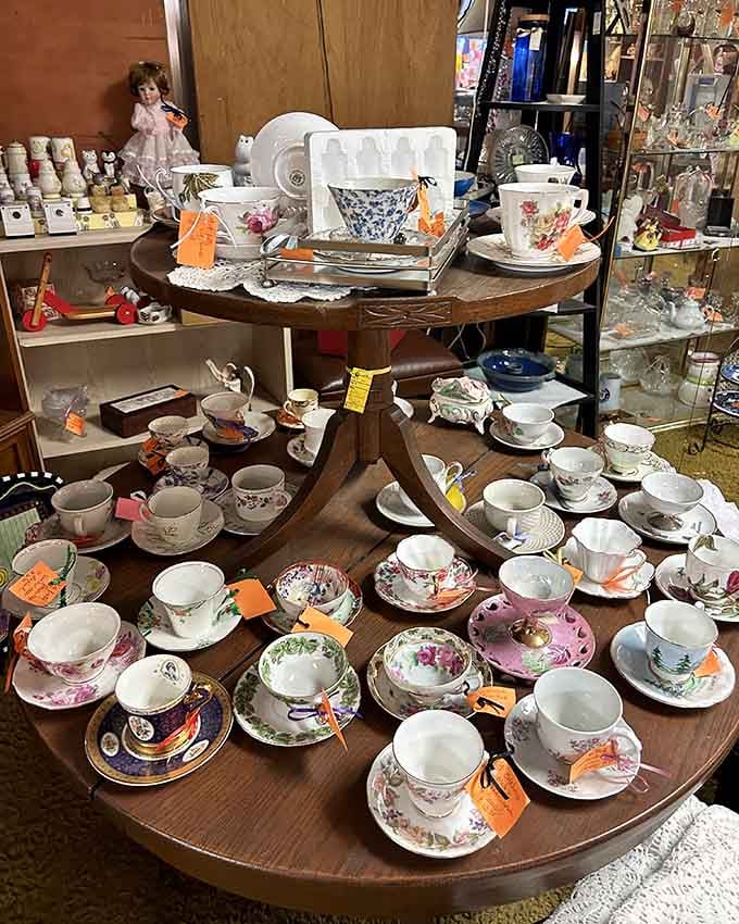 Delicate teacups on vintage wood remind us when afternoon tea was an event, not just a beverage choice.