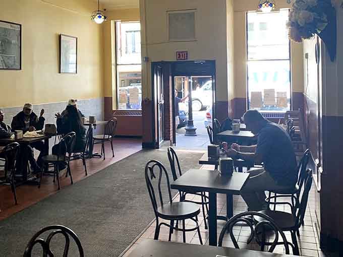 Natural light floods the simple dining room where locals have gathered for generations of exceptional Italian food.