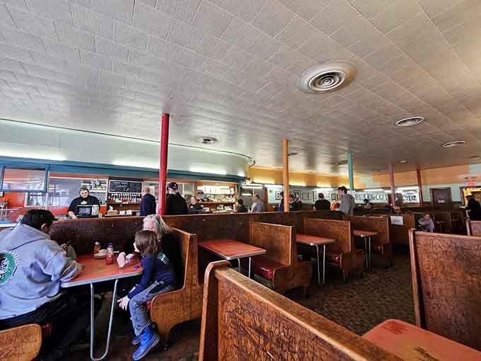 Families filling booths just like their parents and grandparents did, creating new memories while honoring delicious old traditions.