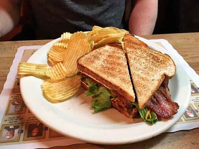 Crispy bacon, fresh lettuce, ripe tomato, and cheddar on toasted bread, the BLT elevated to art form status.