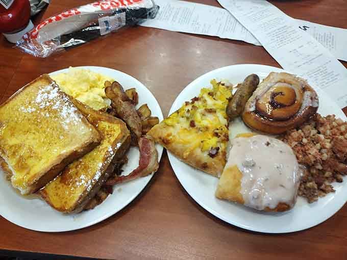 French toast, sausage, eggs, and a cinnamon roll prove breakfast at a buffet is pure genius.