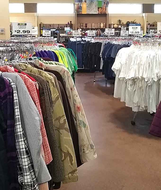 Blazers and tees coexist peacefully, proving this store caters to every dress code from boardroom to backyard.