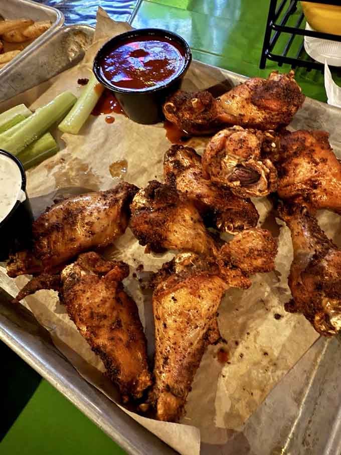 These wings piled high on that tray look like they're ready to solve all your problems.