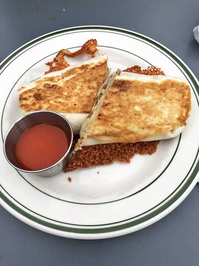 That breakfast burrito got grilled to golden perfection, creating crispy edges that crunch with every satisfying bite.