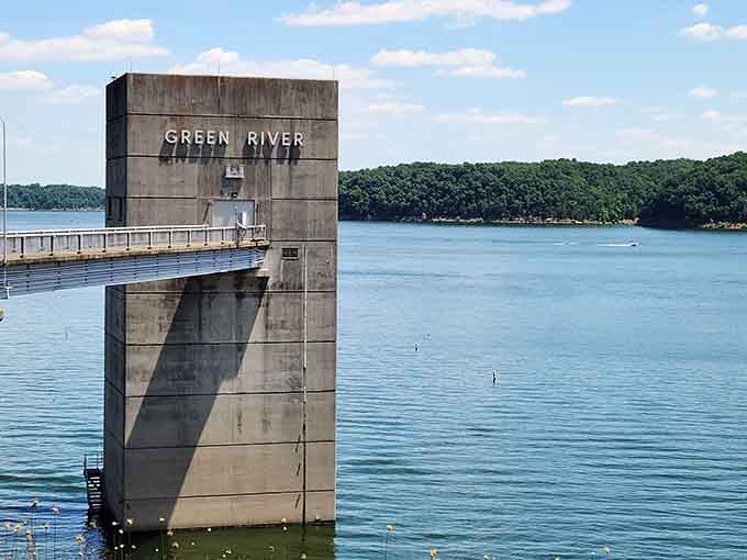 A concrete sentinel stands guard where Green River meets the lake&mdash;industrial beauty framing nature's tranquil masterpiece.