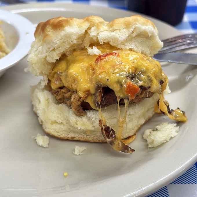 The Midnight Rider biscuit oozes with melted cheese, making every bite feel like a small victory for breakfast lovers.