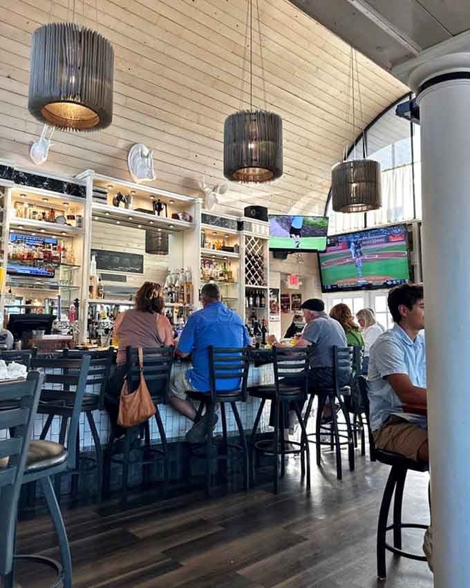 The buzz of happy diners under those industrial pendant lights tells you everything you need to know.