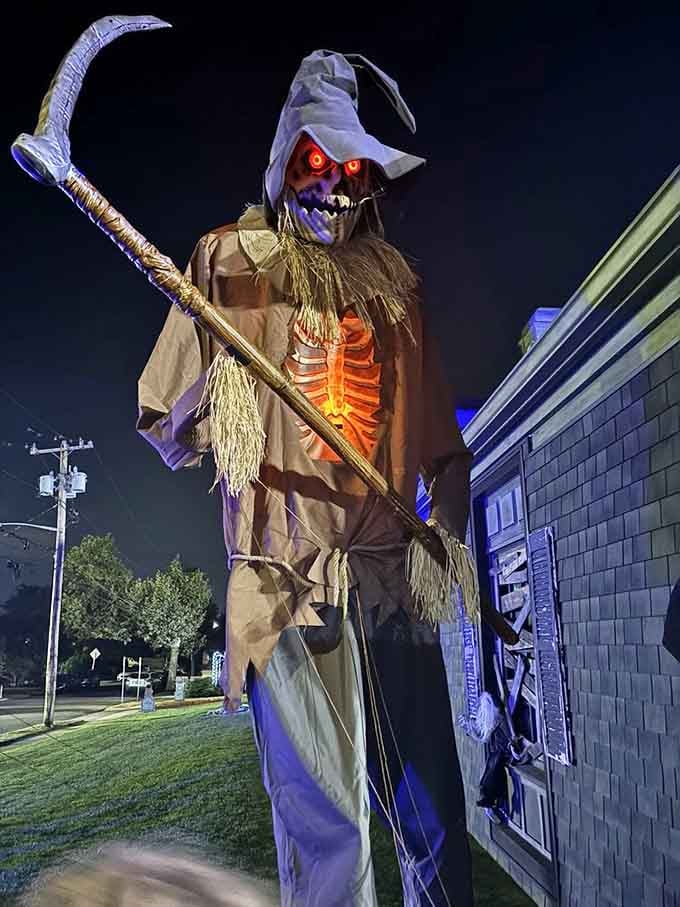 A towering Grim Reaper figure welcomes you because subtlety is overrated when you're running a haunted burger joint.