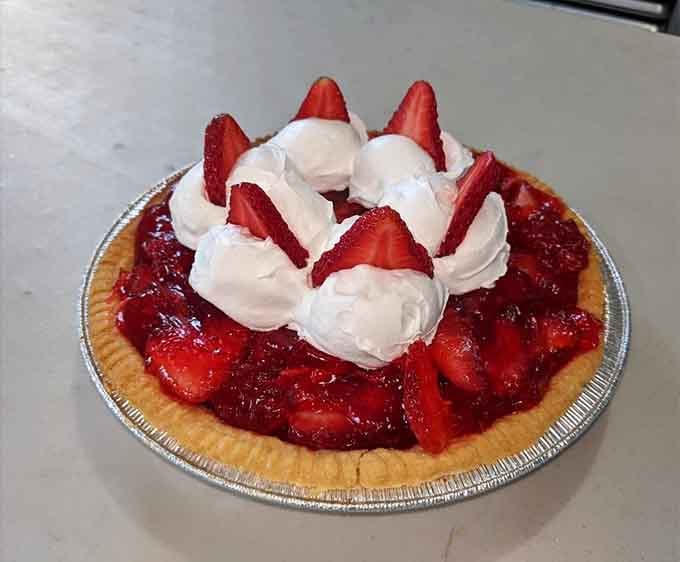 This strawberry pie looks like summer decided to throw itself a party and forgot to send invitations out.