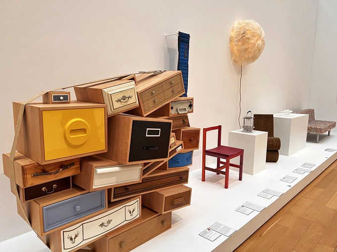 Drawers stacked like a fever dream, proving that organization is entirely a matter of artistic perspective.