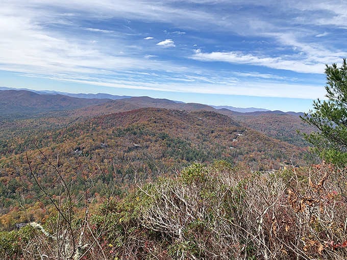 Layer upon layer of mountain ridges stretch endlessly, making your problems feel refreshingly insignificant today.