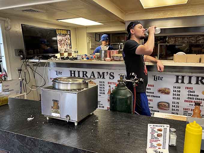 Behind the counter, the magic happens with practiced efficiency that comes from years of perfecting the craft.