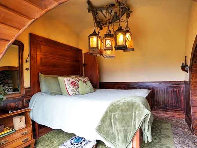 Sleep under a chandelier fit for the Shire in a bedroom that's cozy without feeling cramped.