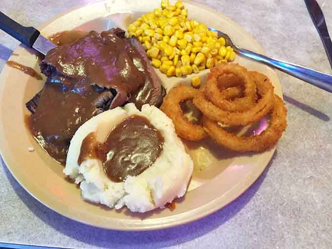 Roast beef with gravy, mashed potatoes, and onion rings, because sometimes you need options beyond chicken.