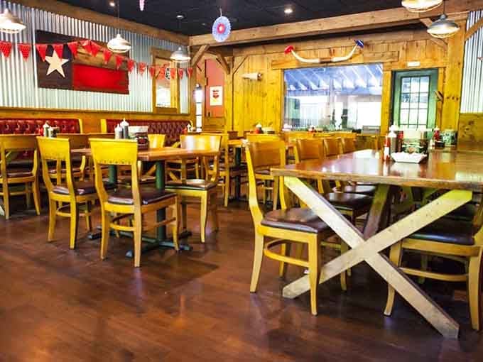 Corrugated metal walls and wooden tables prove fancy décor can't compete with genuine barbecue atmosphere.