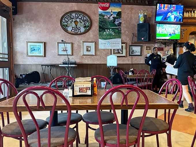 Spacious dining room with bentwood chairs where conversations flow as freely as the drinks at the bar.
